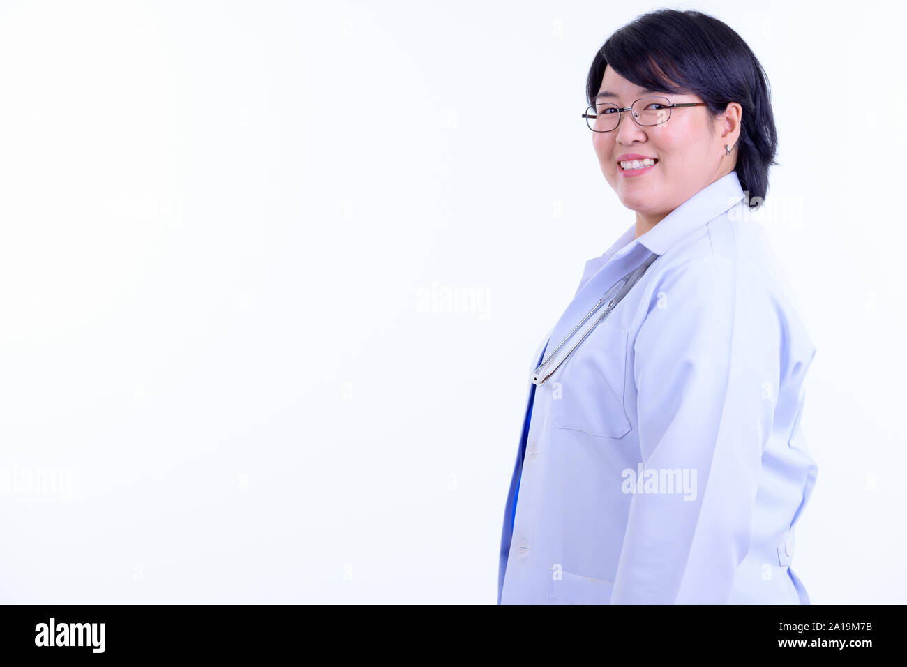 Happy overweight asian woman doctor hi-res stock photography and images ...