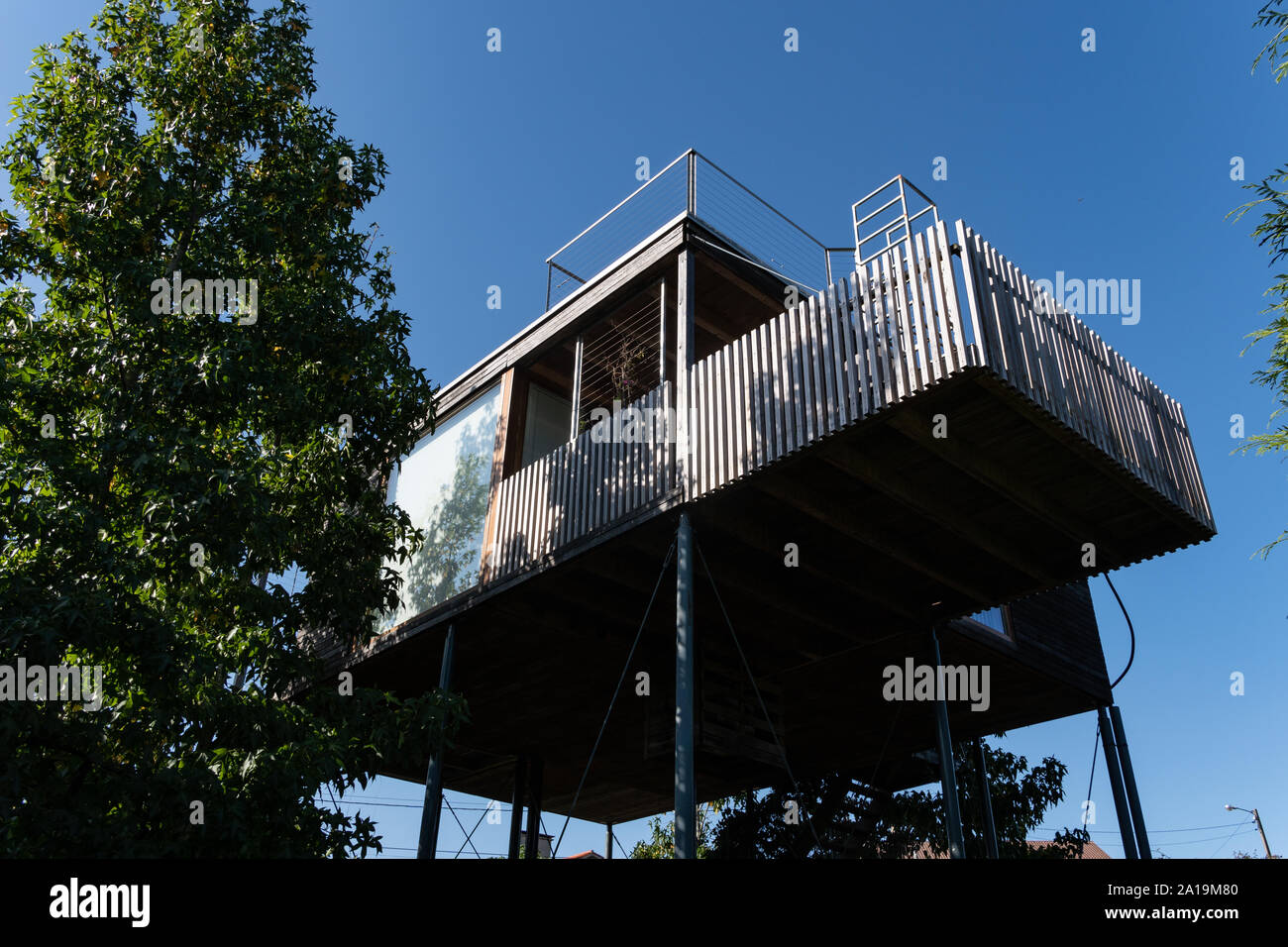 Modern wood cabin facade detail. Elevated house like a tree house Stock ...