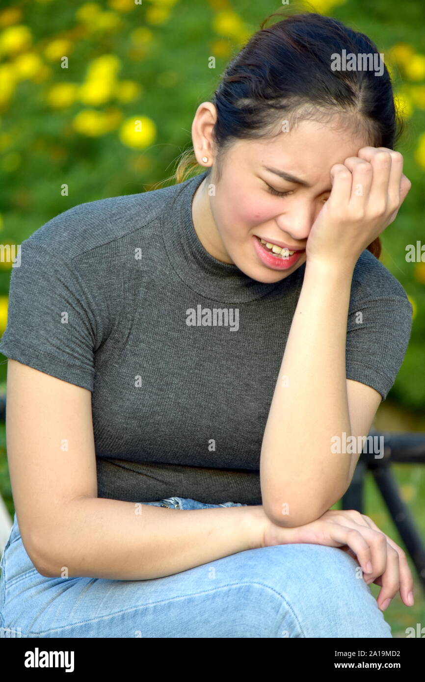 Weeping woman looks hi-res stock photography and images - Alamy