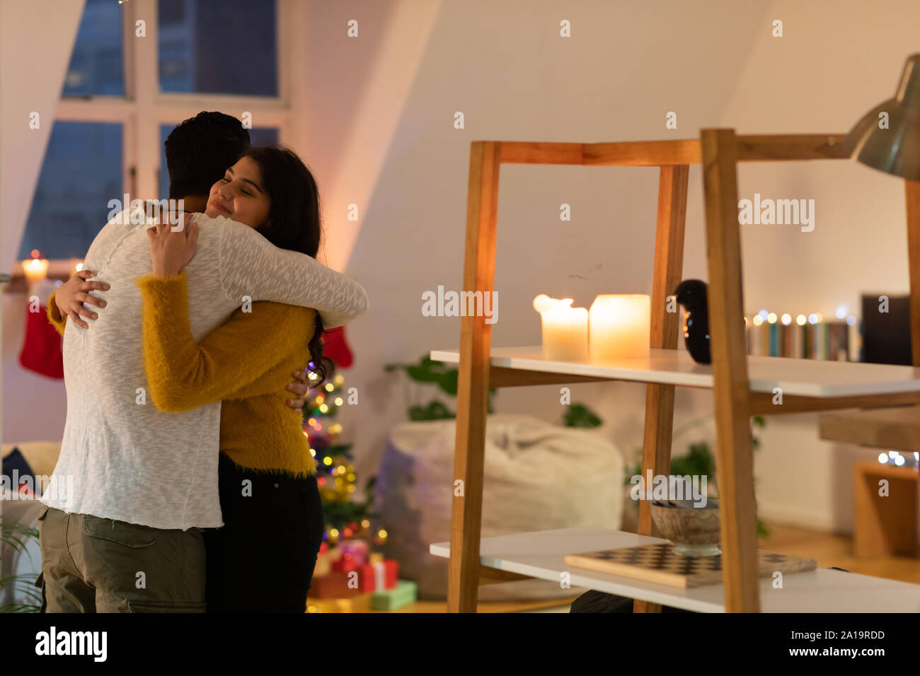 Friends celebrating christmas together hi-res stock photography and ...