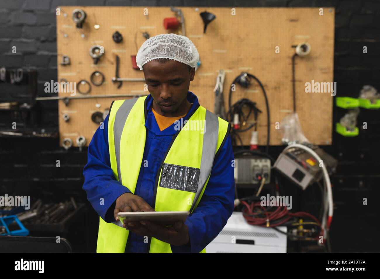 Factory line worker hi-res stock photography and images - Alamy
