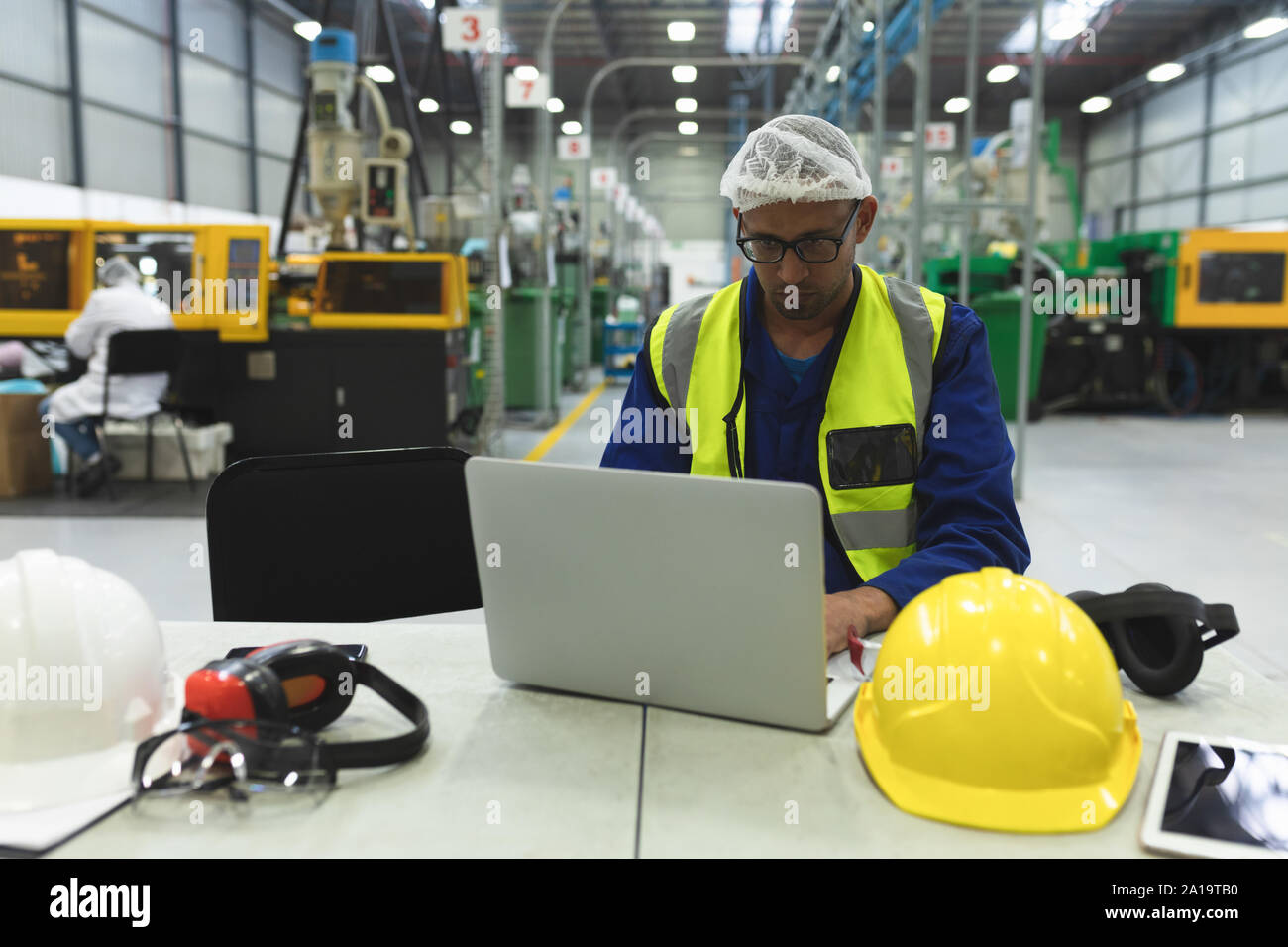 Male worker working laptop sitting hi-res stock photography and images ...