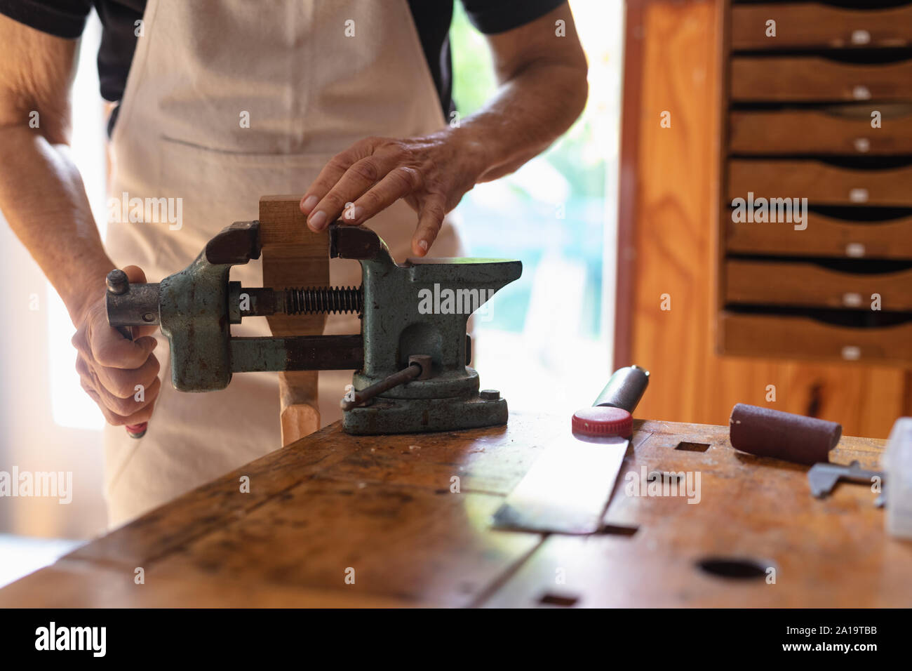 Female luthier at work in a workshop Stock Photo - Alamy