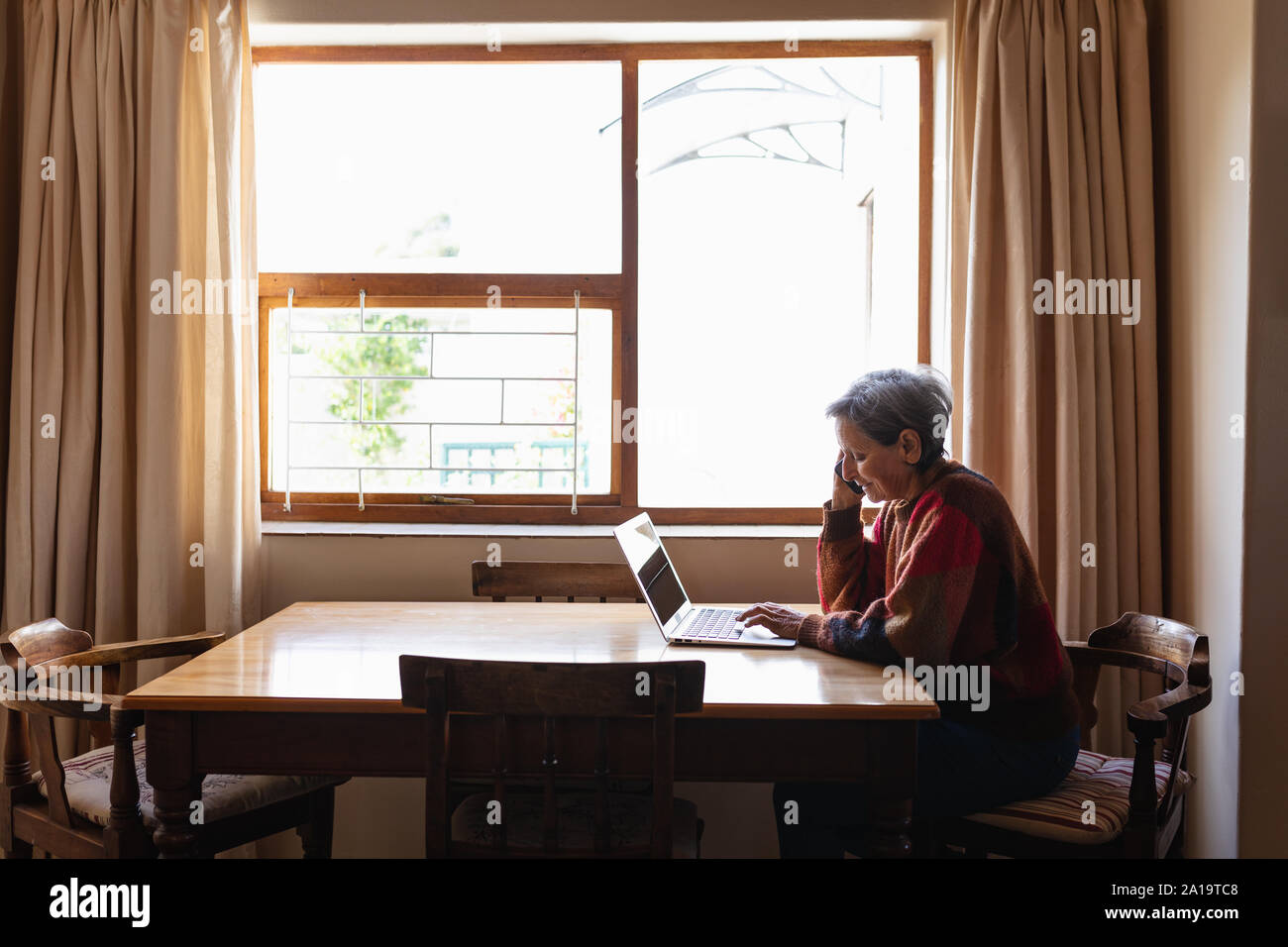 Senior woman enjoying her free time Stock Photo - Alamy