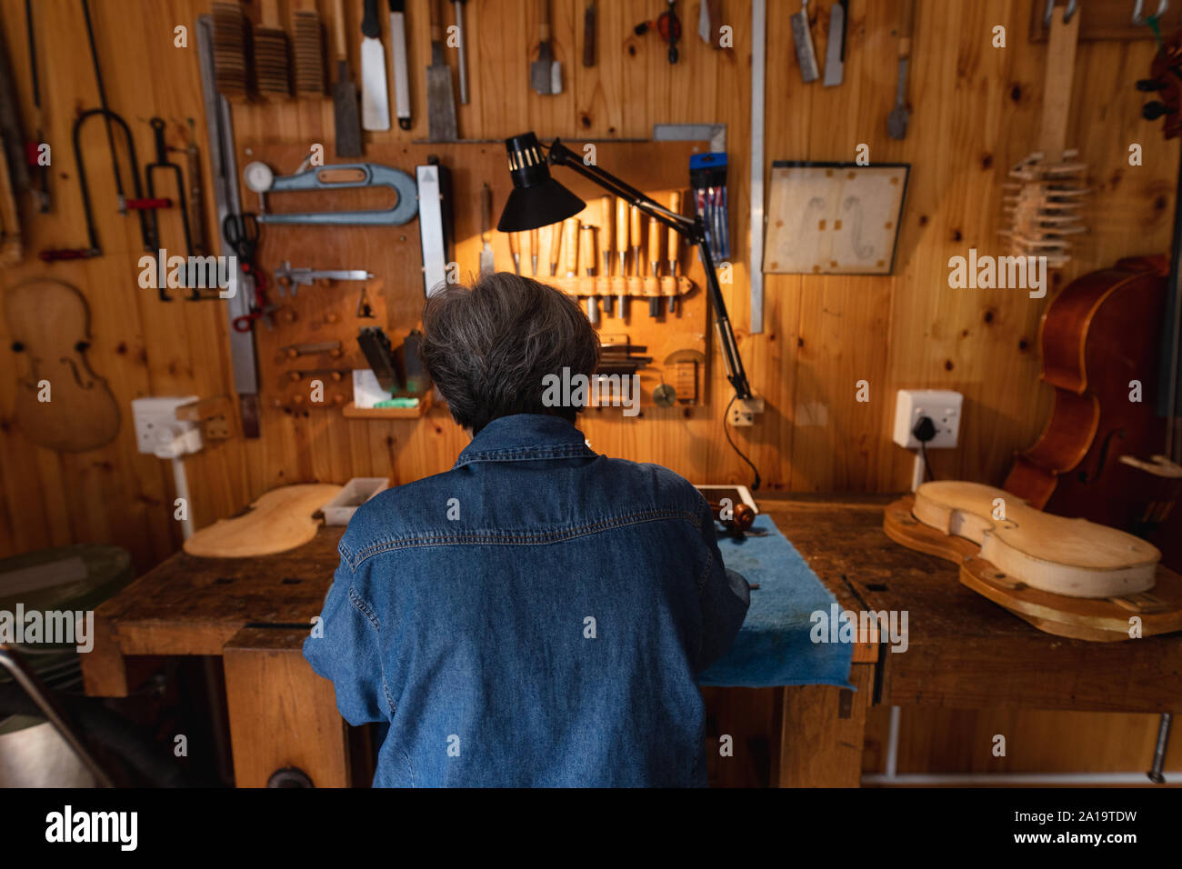 Female violin maker work hi-res stock photography and images - Alamy