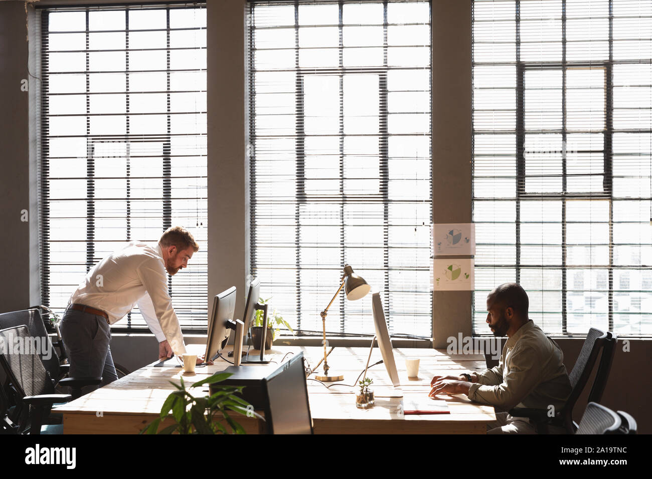 Men in office hi-res stock photography and images - Alamy