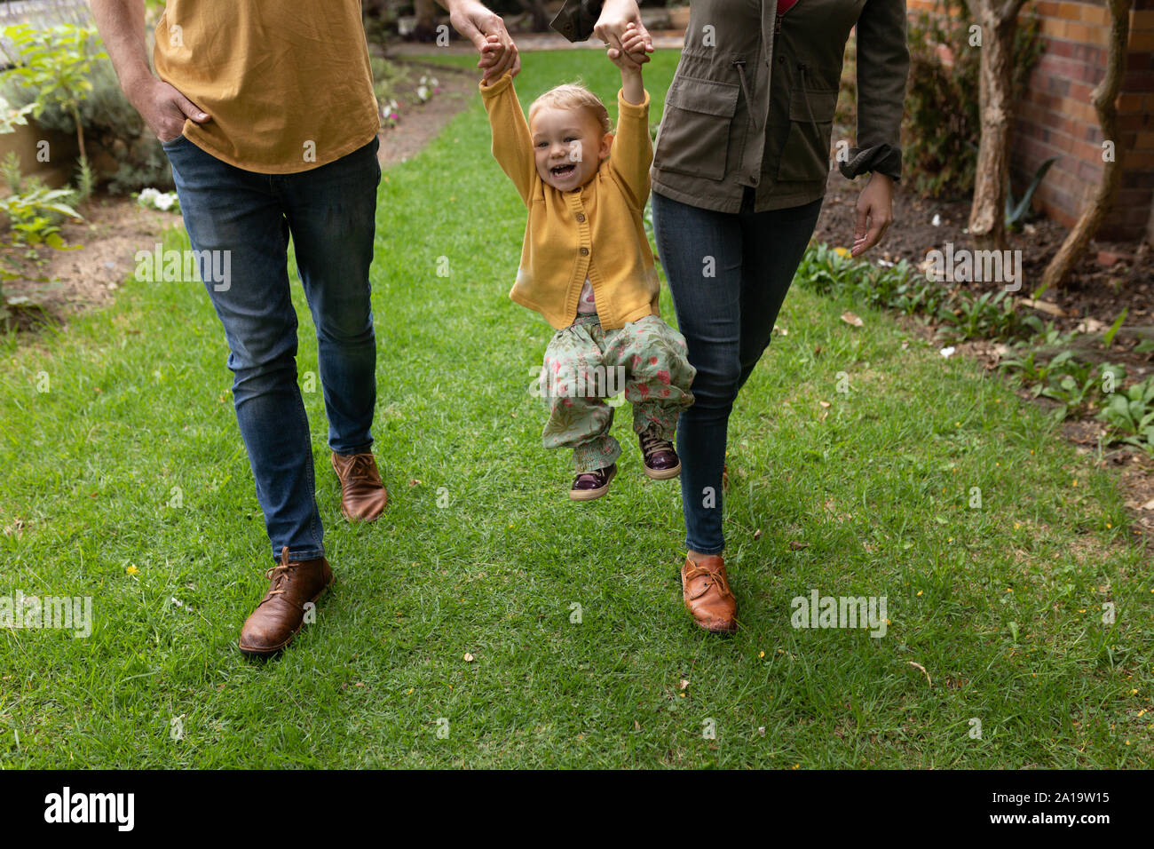 Parents enjoying time with their baby Stock Photo - Alamy