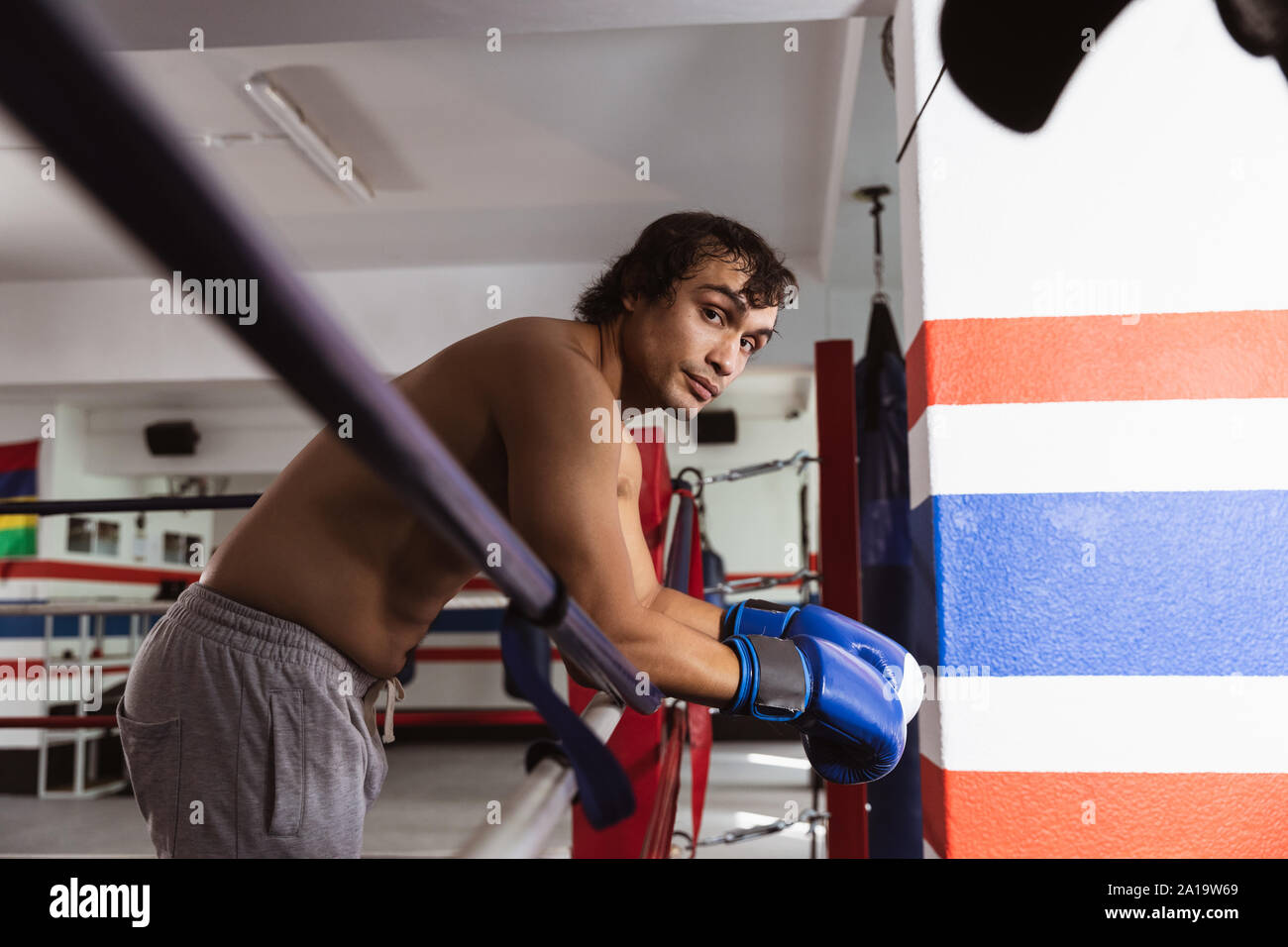 Male boxer in a boxing ring Stock Photo - Alamy