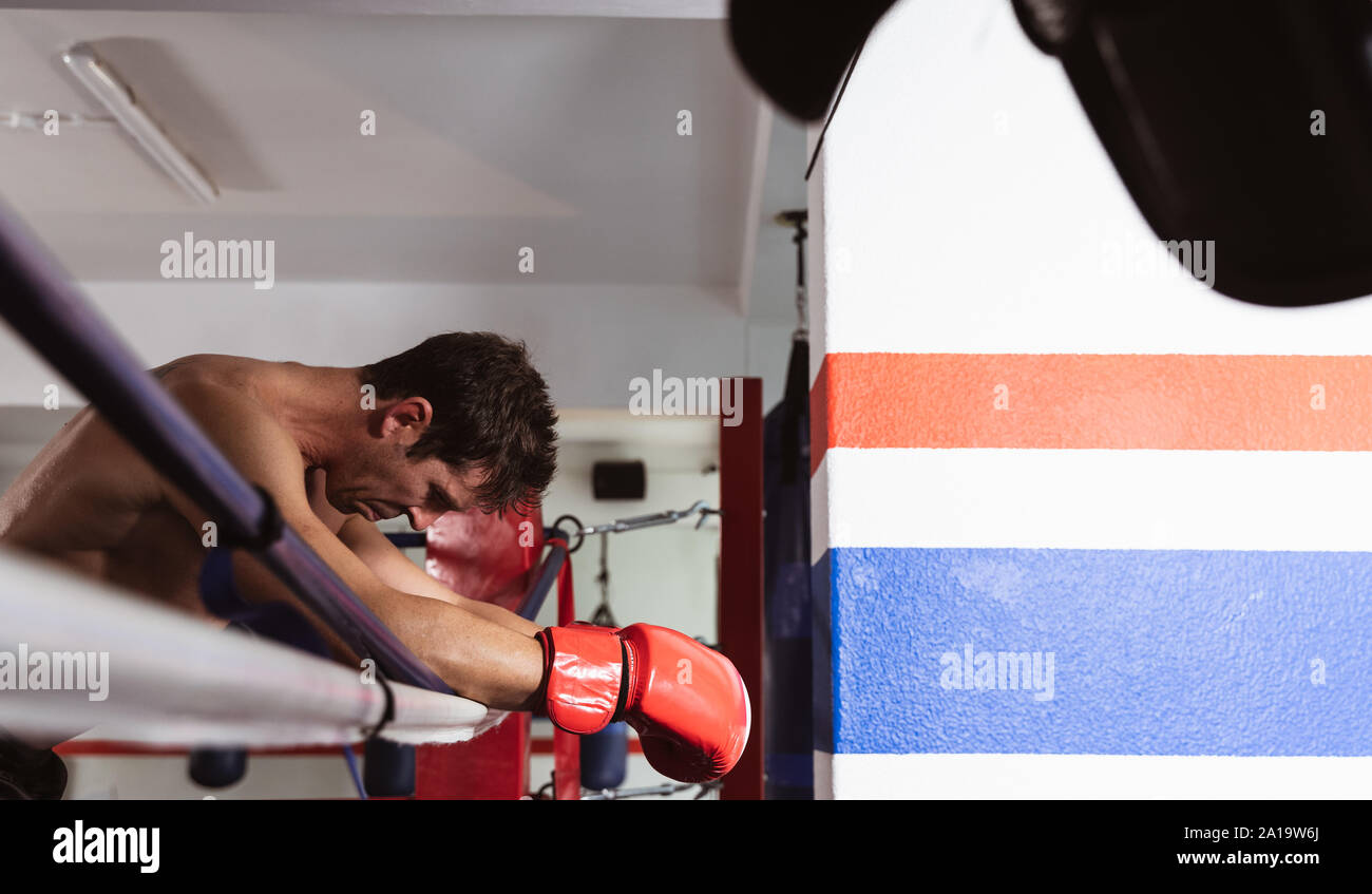 Male boxer in a boxing ring Stock Photo - Alamy