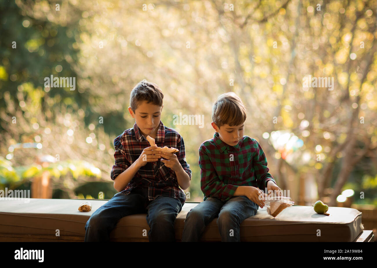 Two brothers enjoying lunch hi-res stock photography and images - Alamy