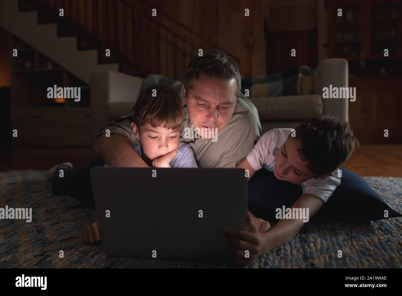Family time together home hi-res stock photography and images - Alamy