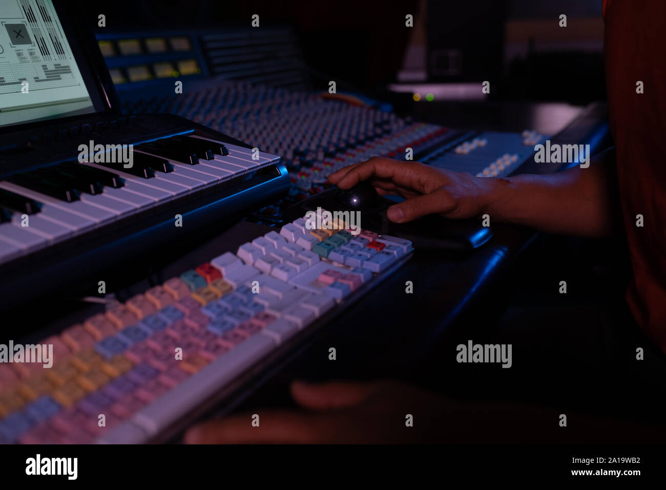 Sound engineer using mixing desk hi-res stock photography and images ...