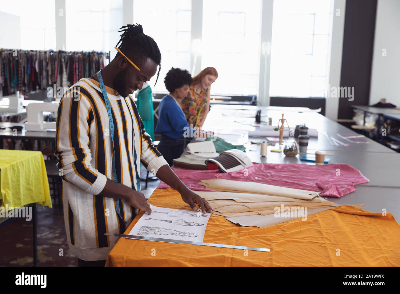 Young students working on projects at a fashion college Stock Photo - Alamy