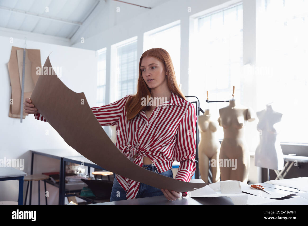 Female student working on a project at a fashion college Stock Photo ...