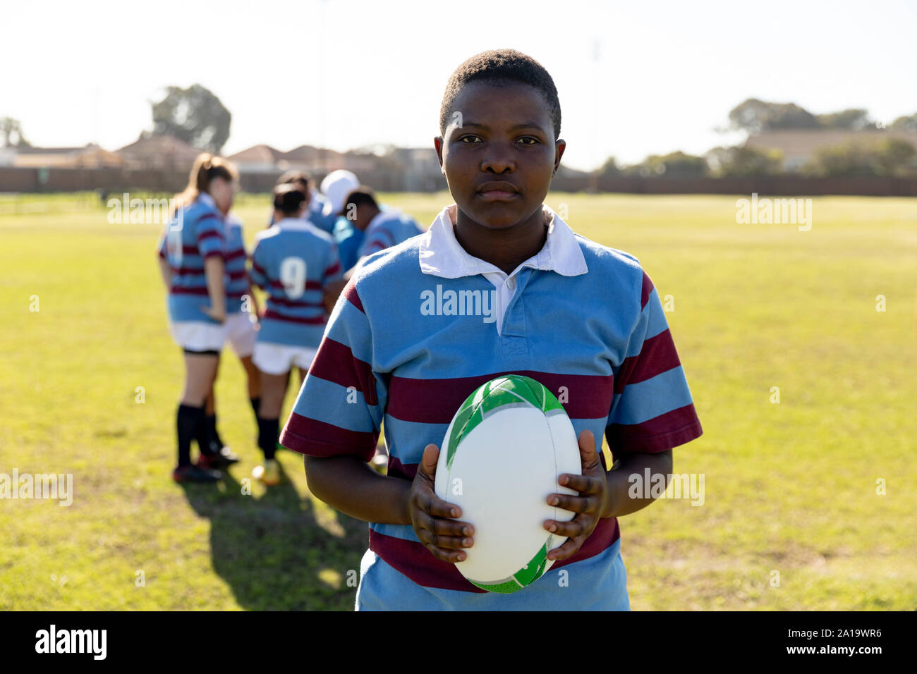 Portrait of young adult female rugby player on a rugby pitch Stock ...
