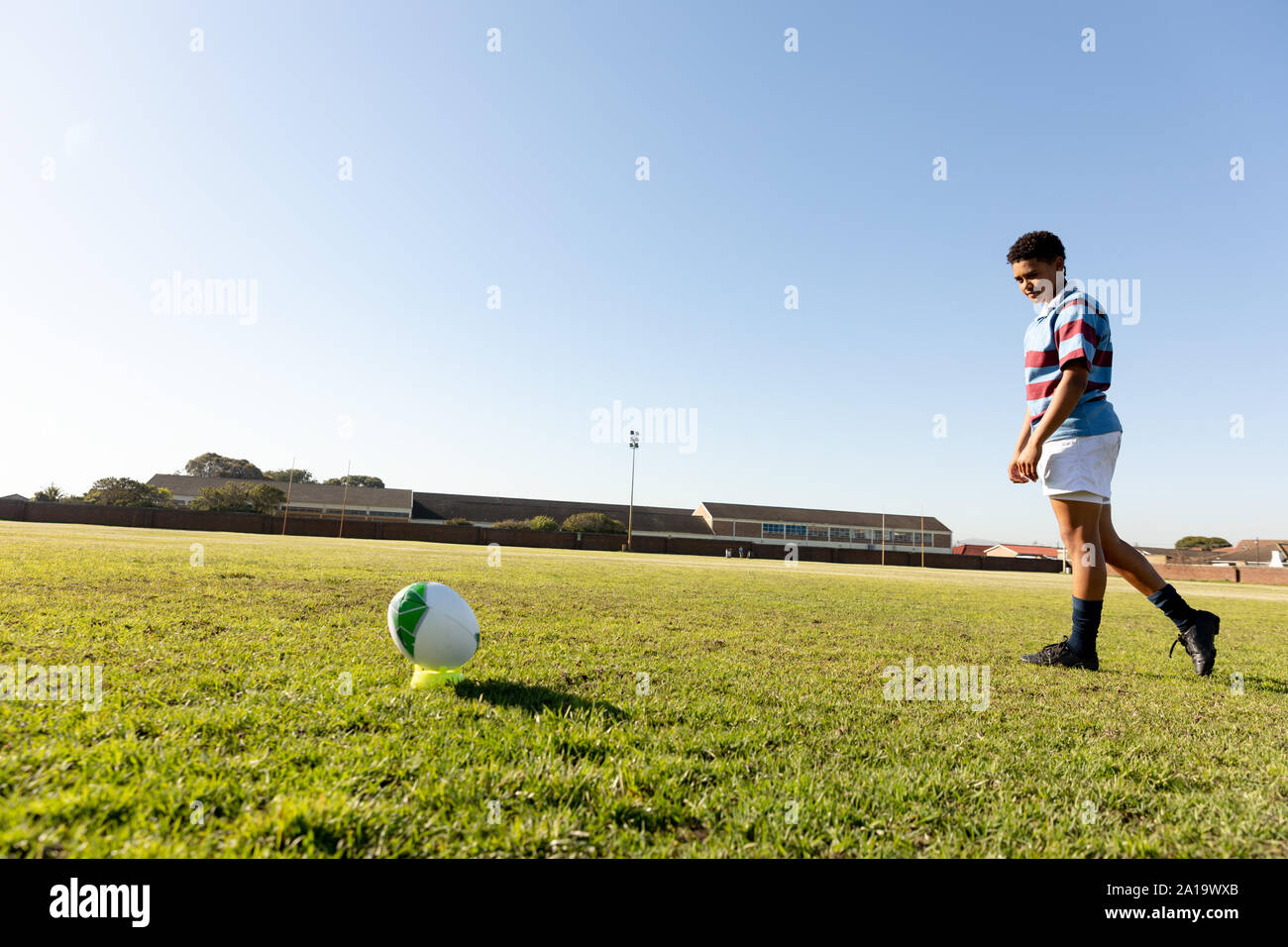 Young adult female rugby player on a rugby pitch Stock Photo - Alamy