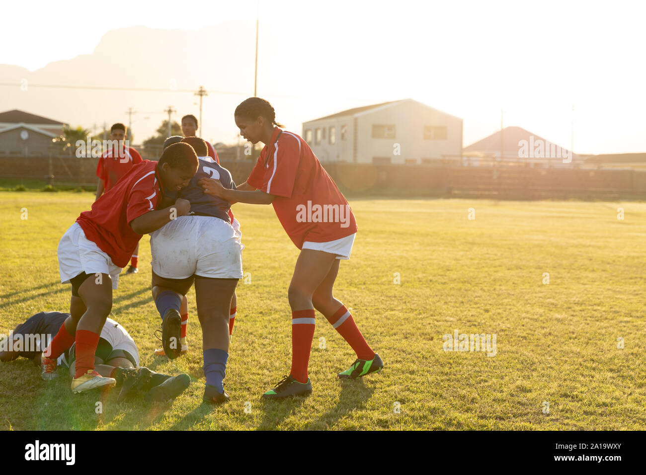Young adult female rugby team Stock Photo - Alamy