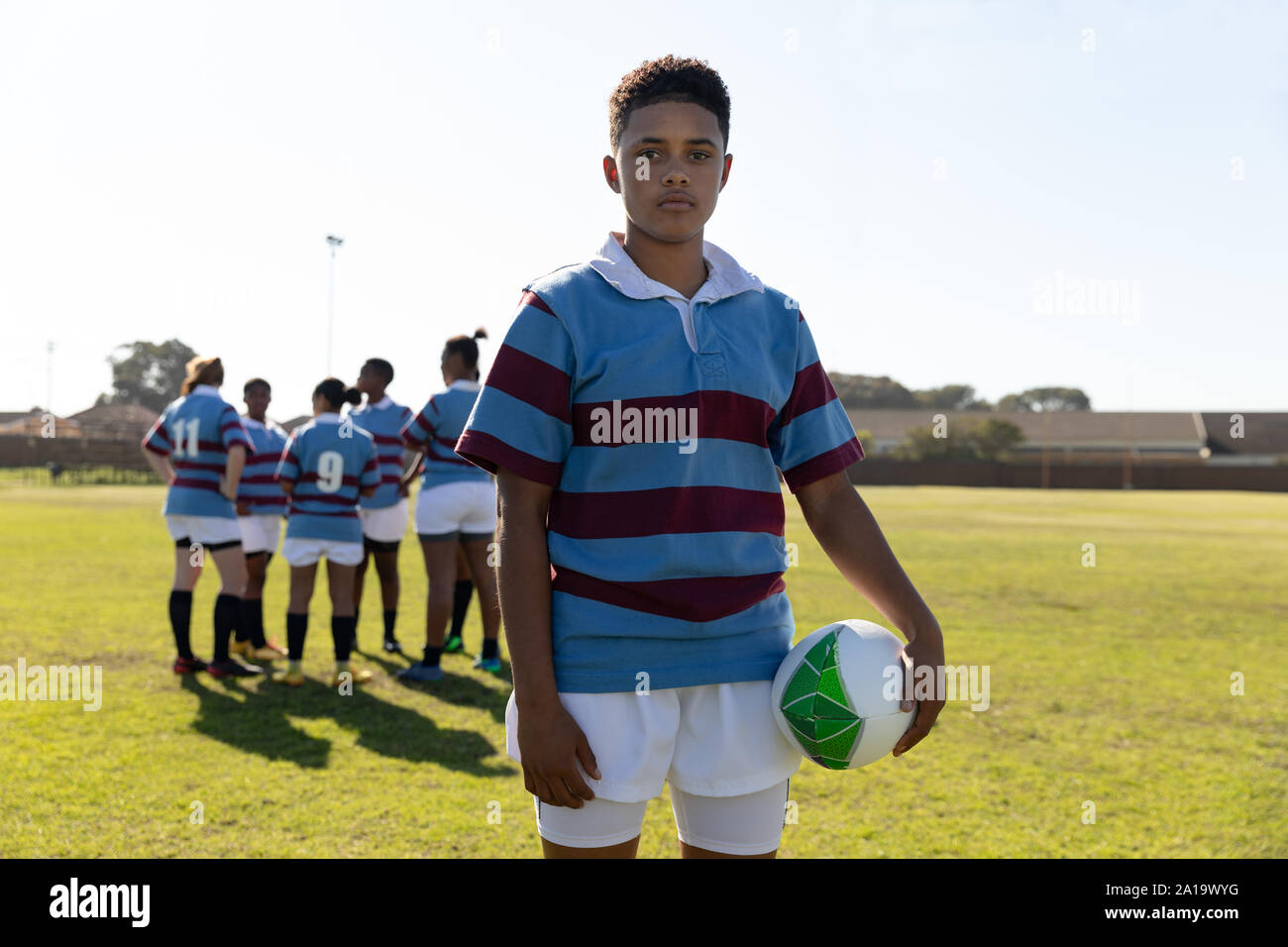 Portrait of young adult female rugby player on a rugby pitch Stock ...