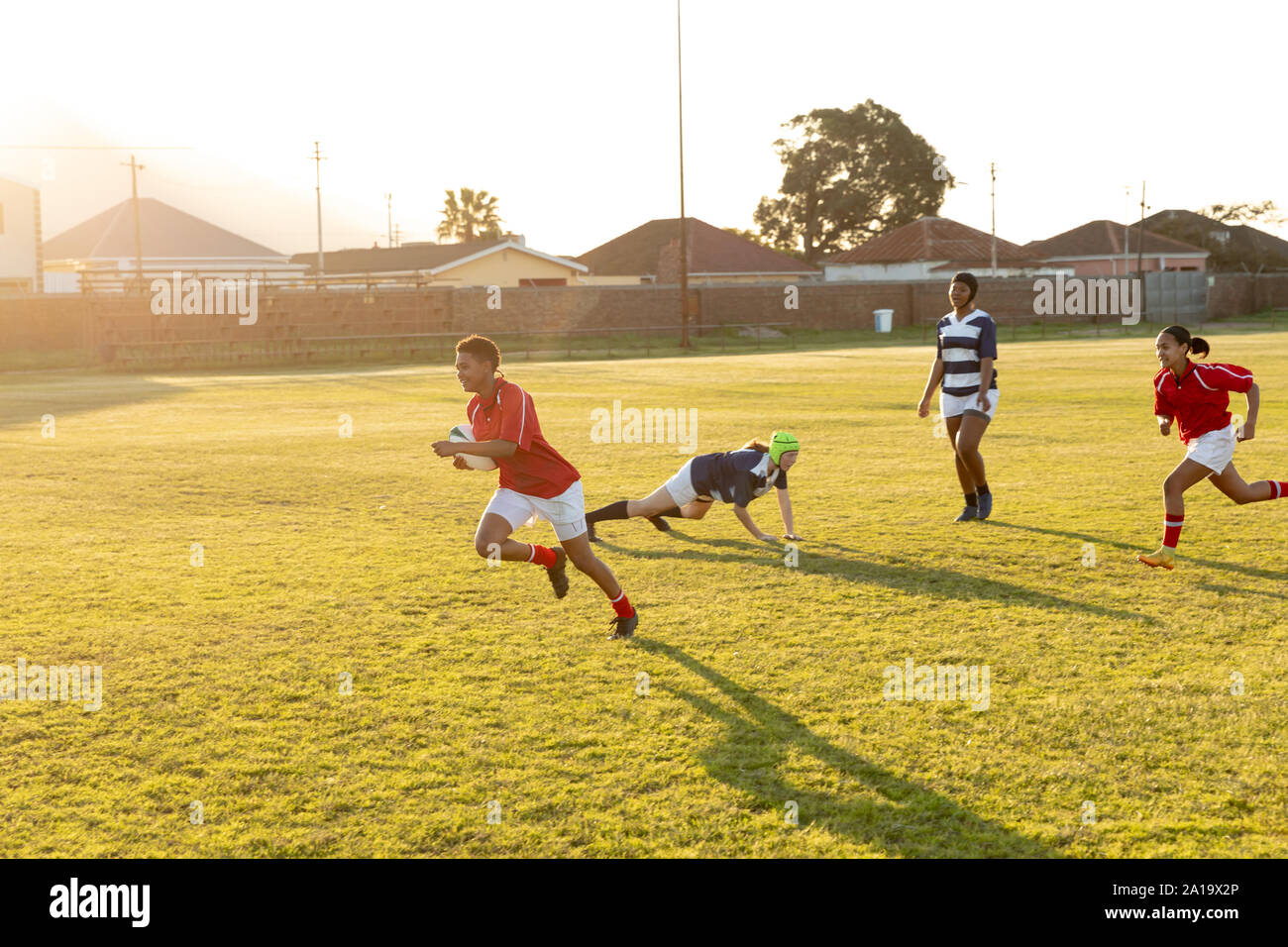 Young adult female rugby team Stock Photo - Alamy