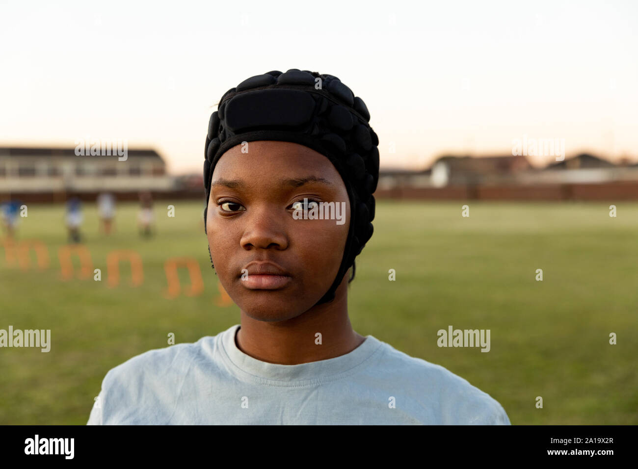 Portrait of young adult female rugby player on a rugby pitch Stock ...