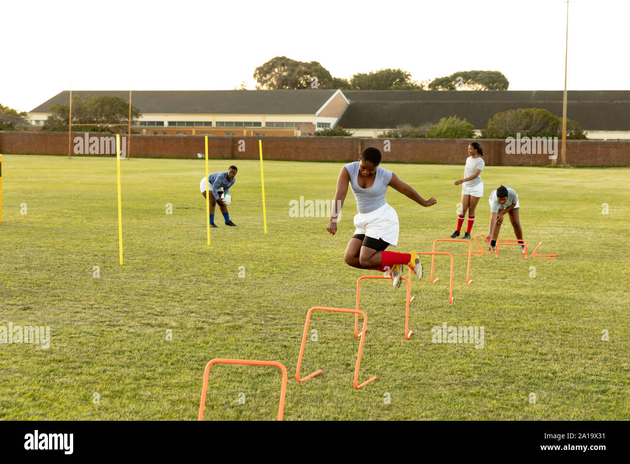 Young adult female rugby team training Stock Photo - Alamy