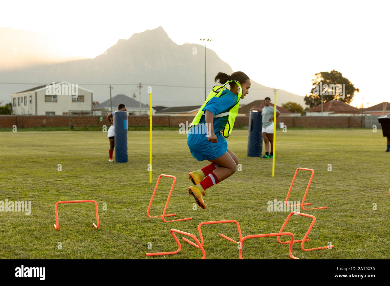 Young adult female rugby team training Stock Photo - Alamy
