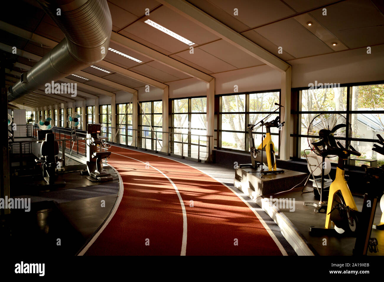 Interior of running track in fitness center Stock Photo - Alamy