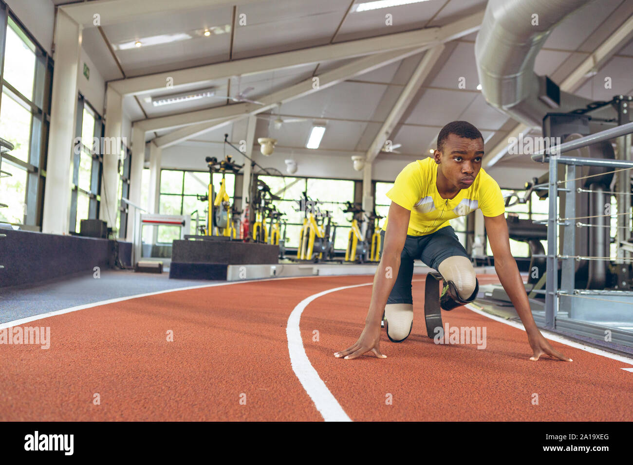 Disabled African American male athletic in starting position on running ...