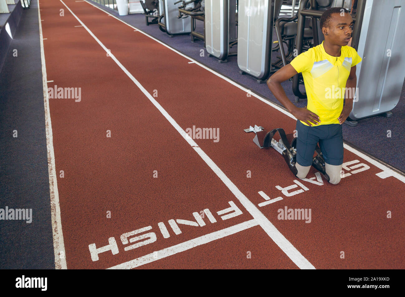 Disabled African American male athletic at starting point on running ...