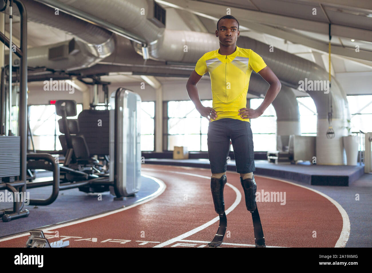 Disabled African American male athletic standing on running track in ...