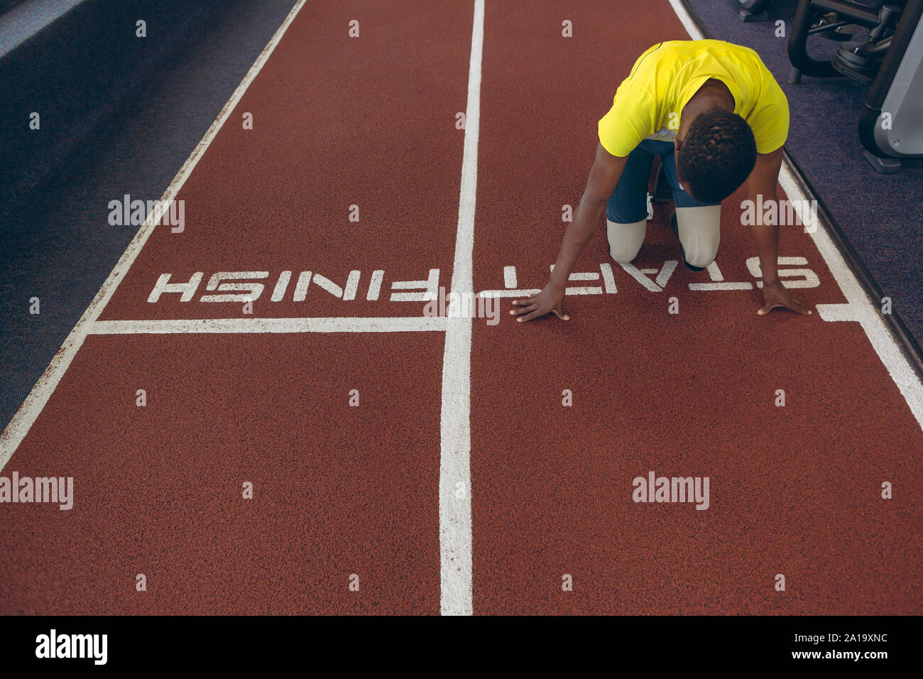 Disabled African American male athletic at starting point on running ...