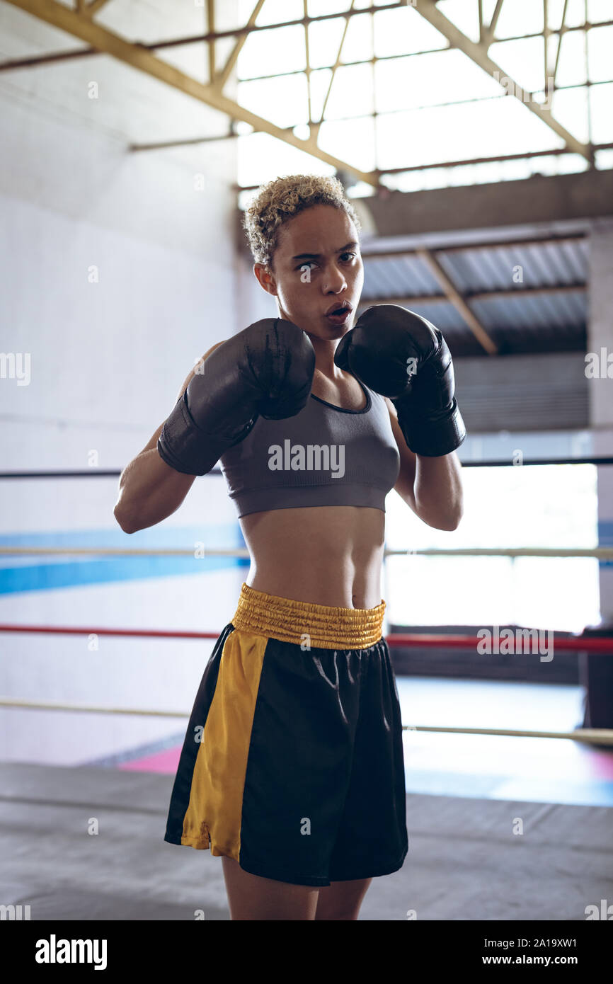 Female boxer practicing boxing in boxing club Stock Photo - Alamy