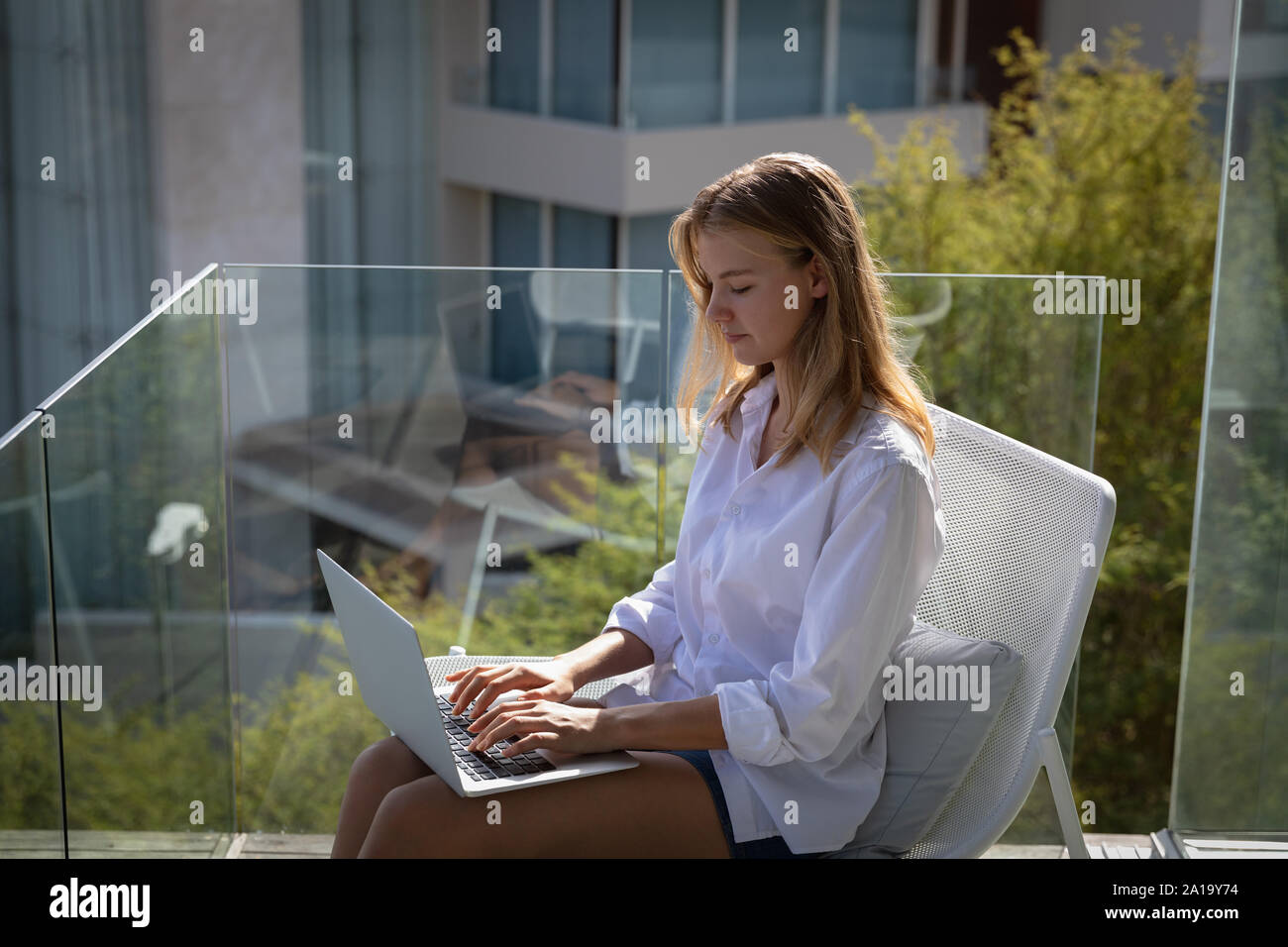 Sitting on the balcony hi-res stock photography and images - Alamy