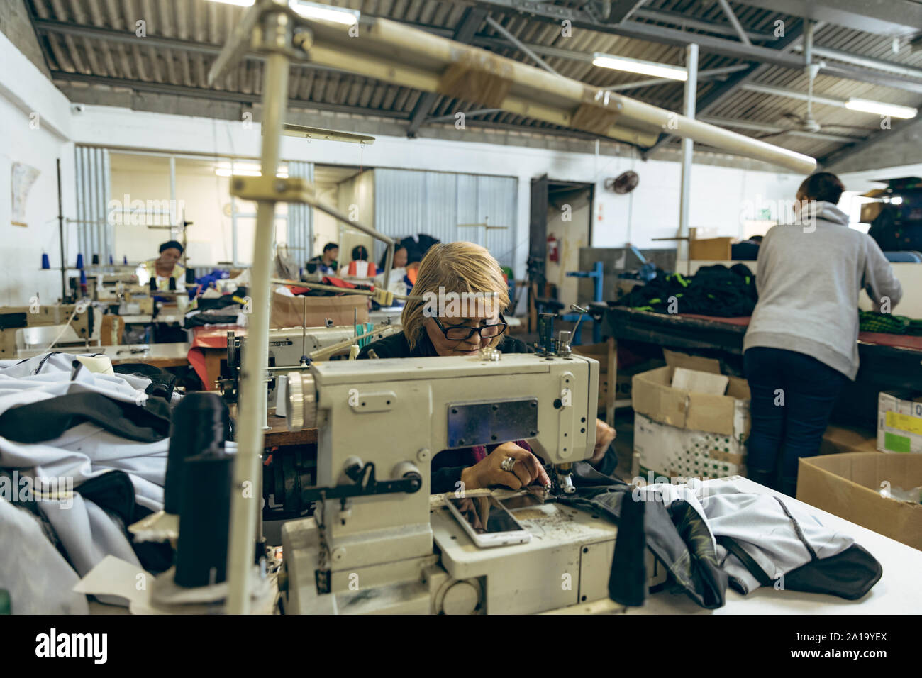 Woman working in a textile factory hi-res stock photography and images ...