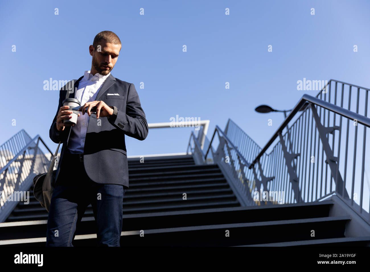 Man checking digital watch hi-res stock photography and images - Alamy