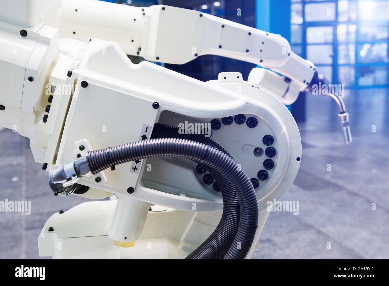 Automatic welding robot in a modern factory in operation Stock Photo ...