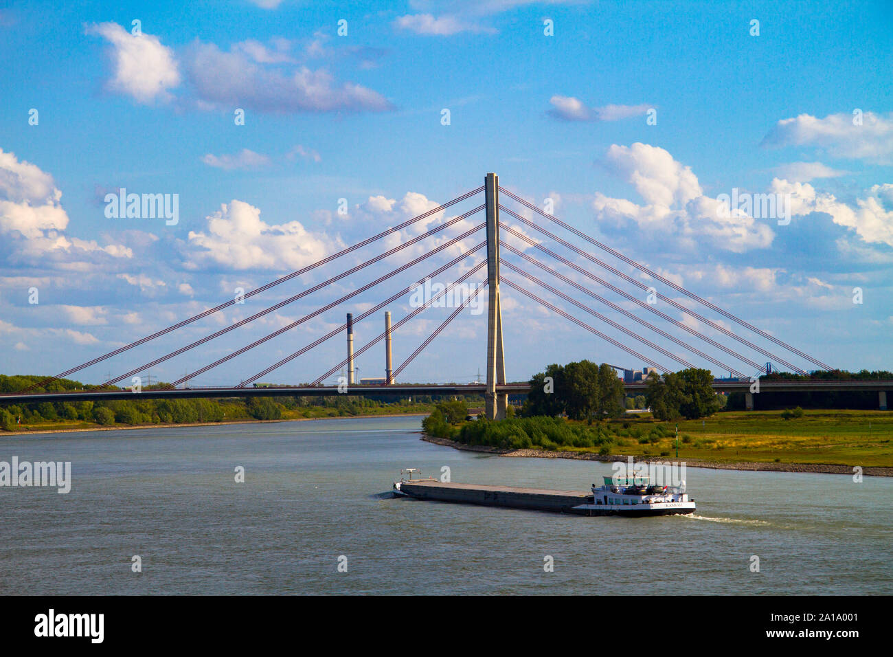 the Niederrhein bridge across the river Rhine, cargo vessel, Wesel ...