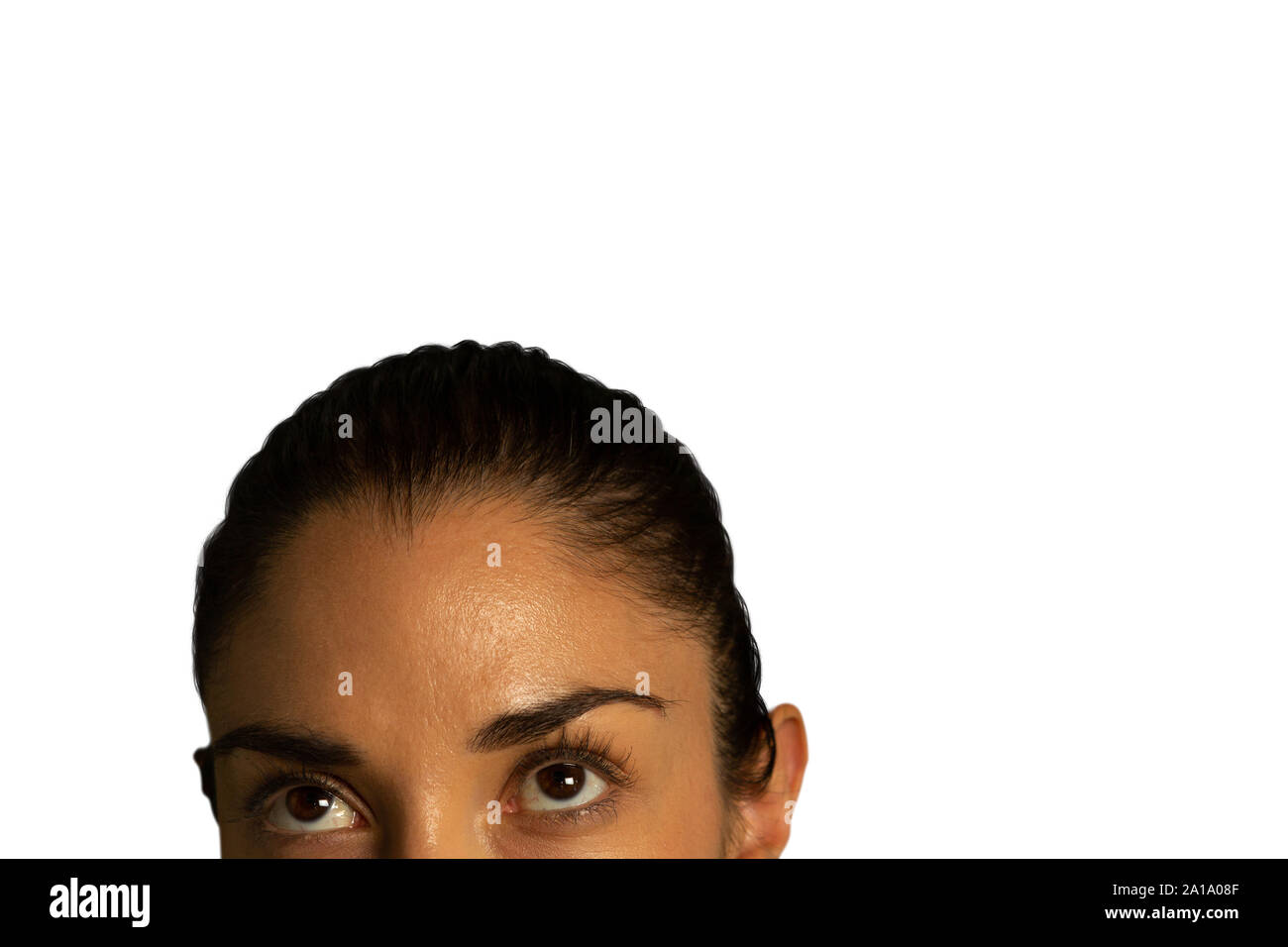 Serious businesswoman looking up Stock Photo - Alamy