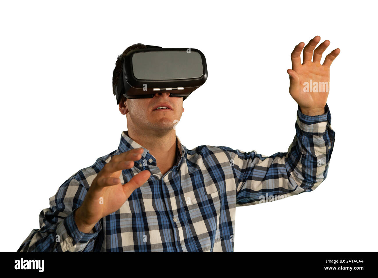 Young businessman using a VR headset Stock Photo - Alamy