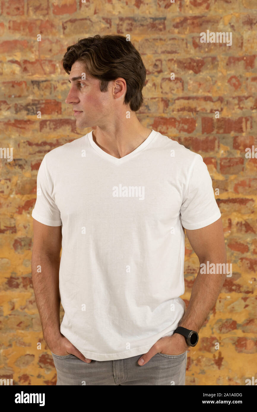 Young man wearing jeans and t shirt hi-res stock photography and images ...