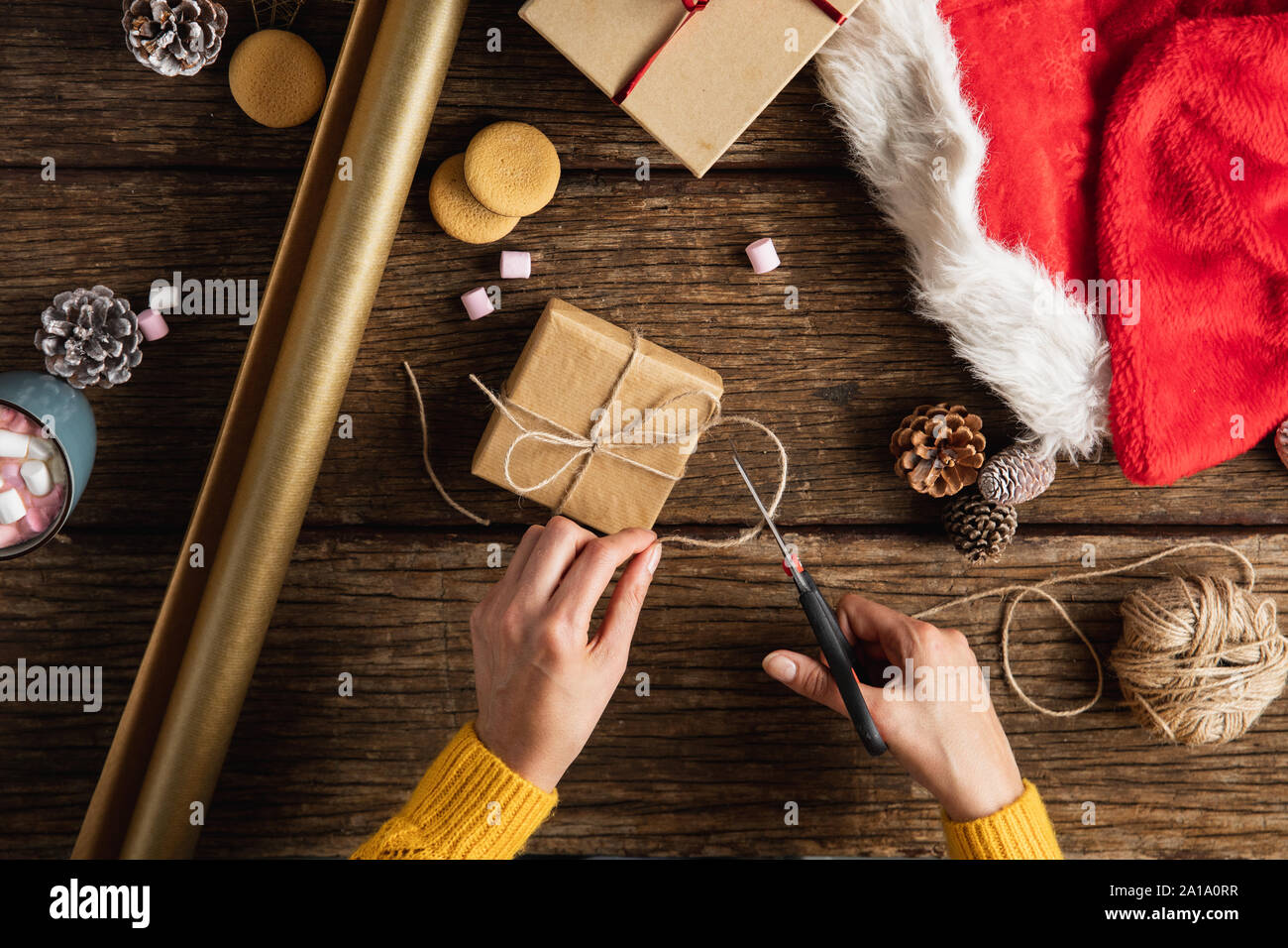 Wrapping hands hi-res stock photography and images - Alamy