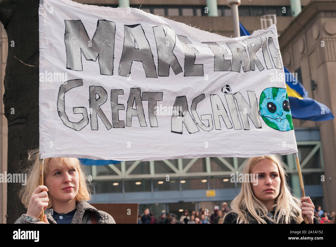 Students hold a placard during a demonstration to raise awareness for ...