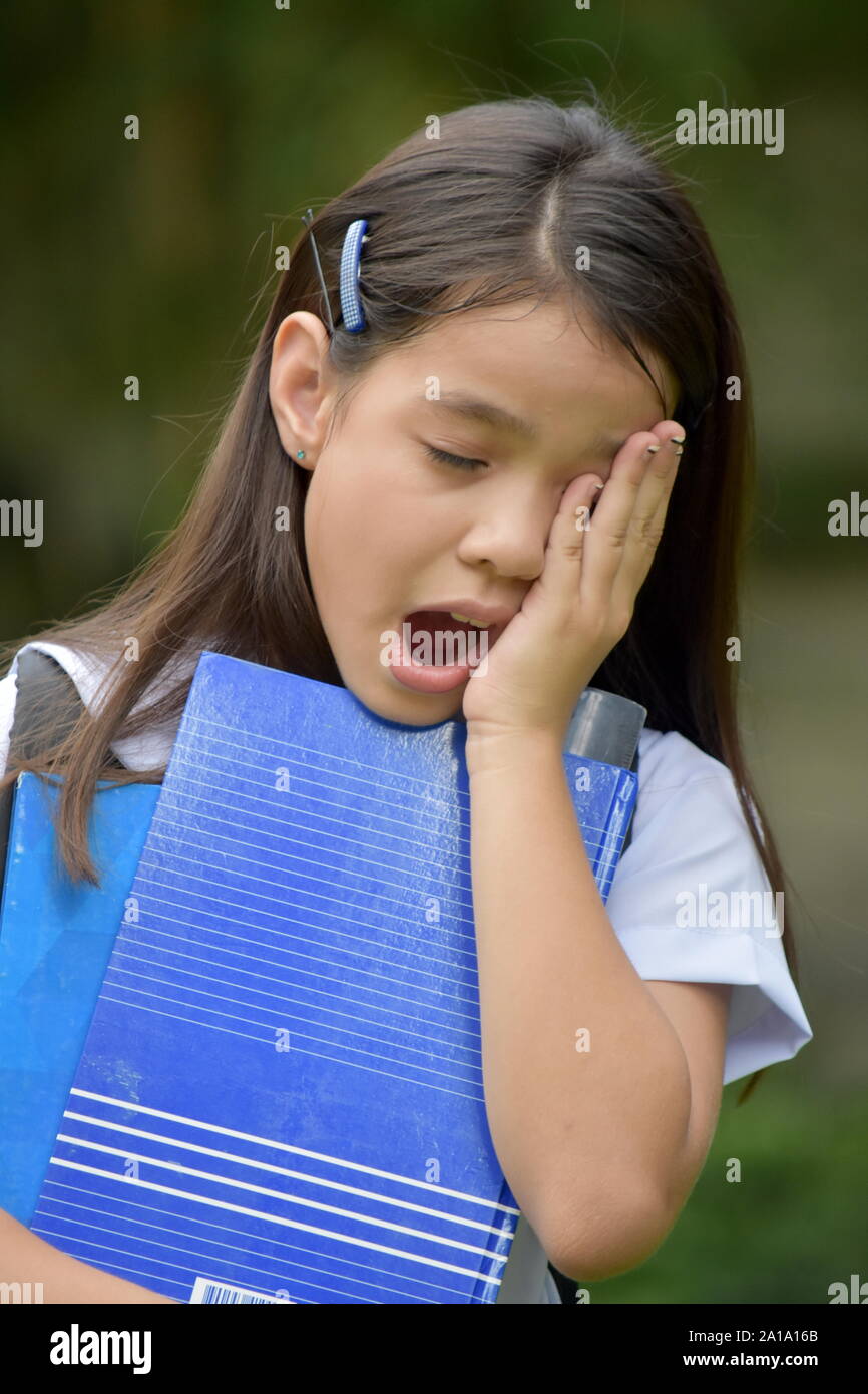 Tired student girl hi-res stock photography and images - Alamy