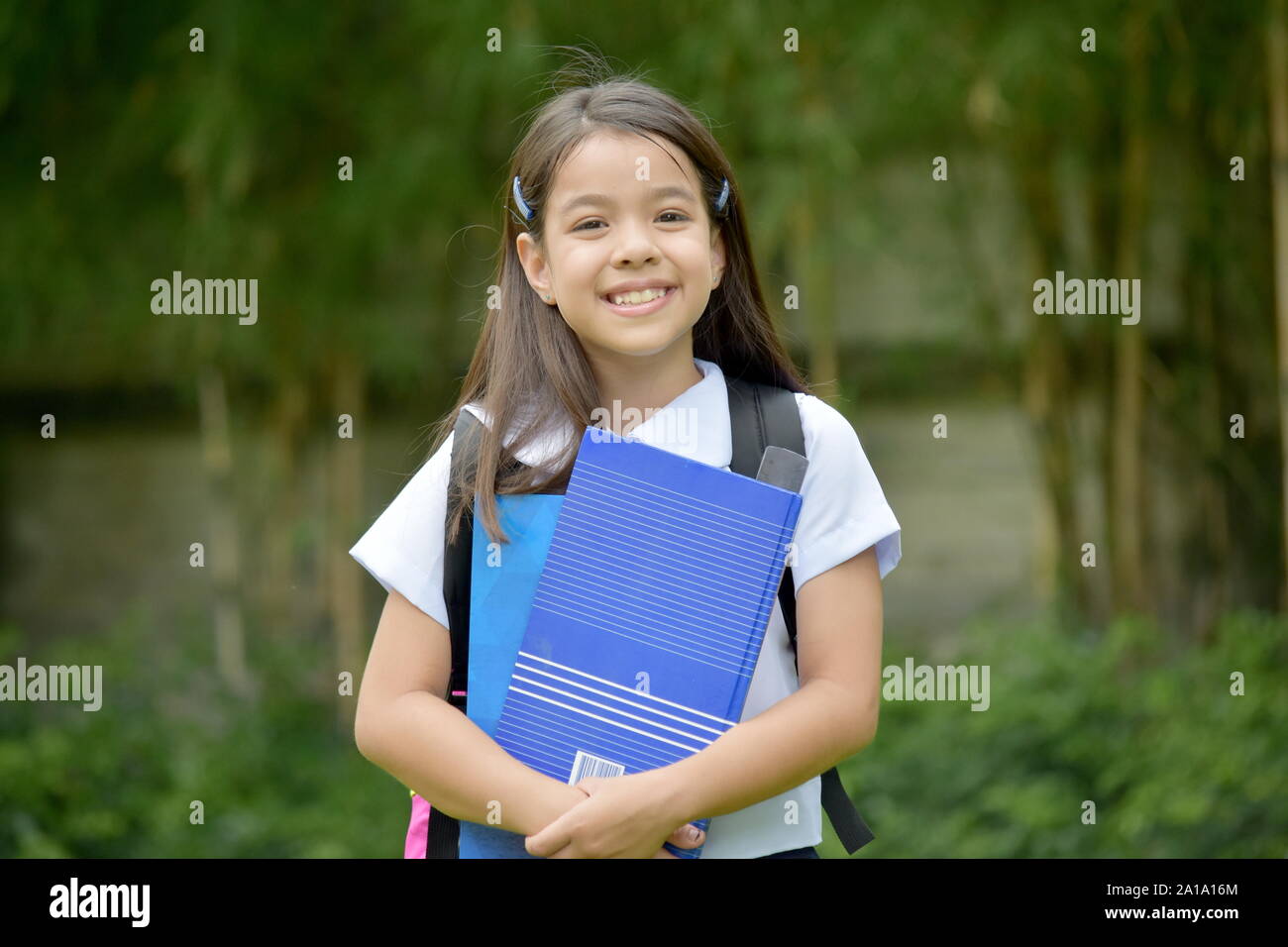 Female student smile writing hi-res stock photography and images - Alamy