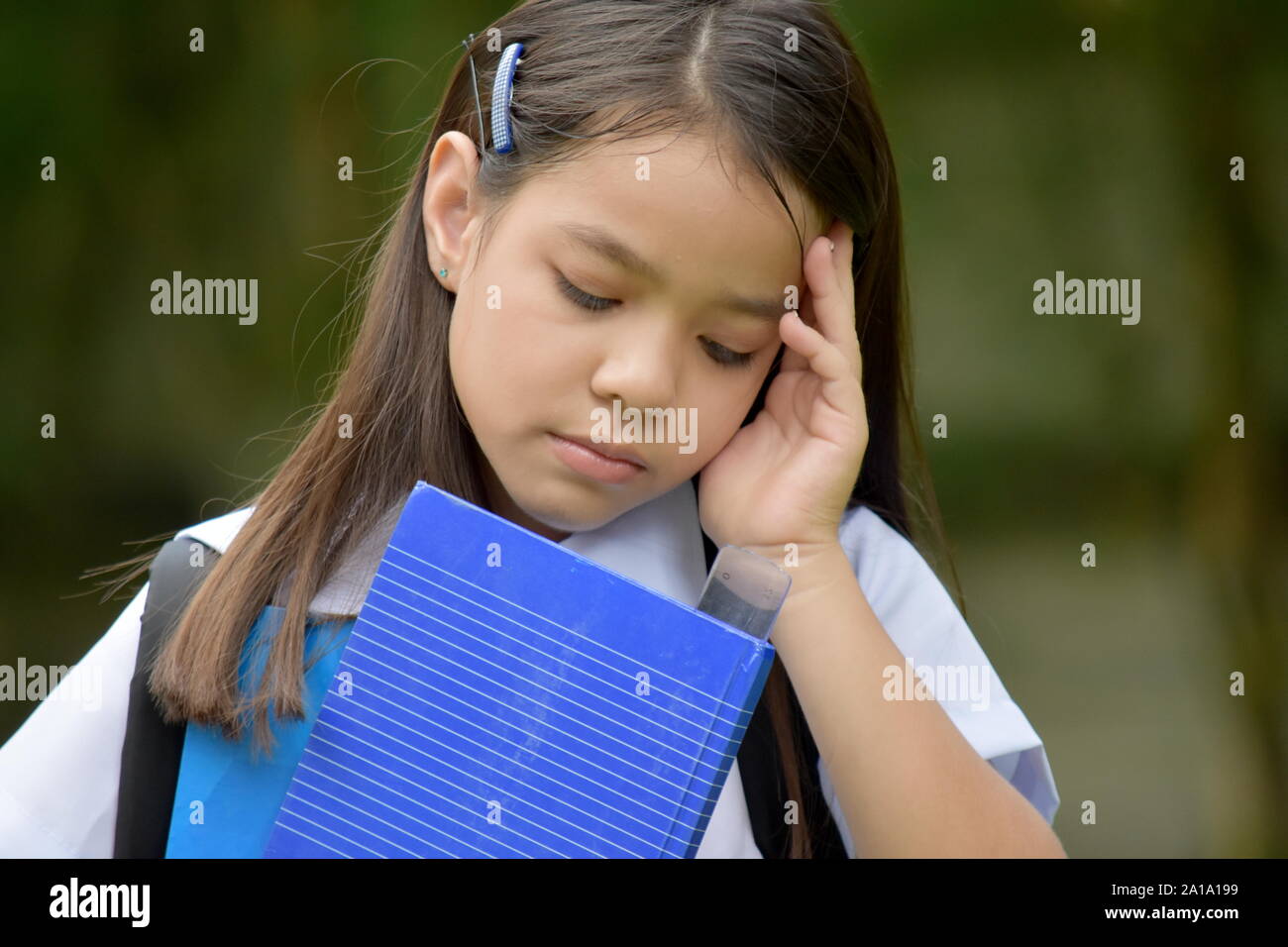 Young Filipina Child Girl Student And Sadness Stock Photo - Alamy