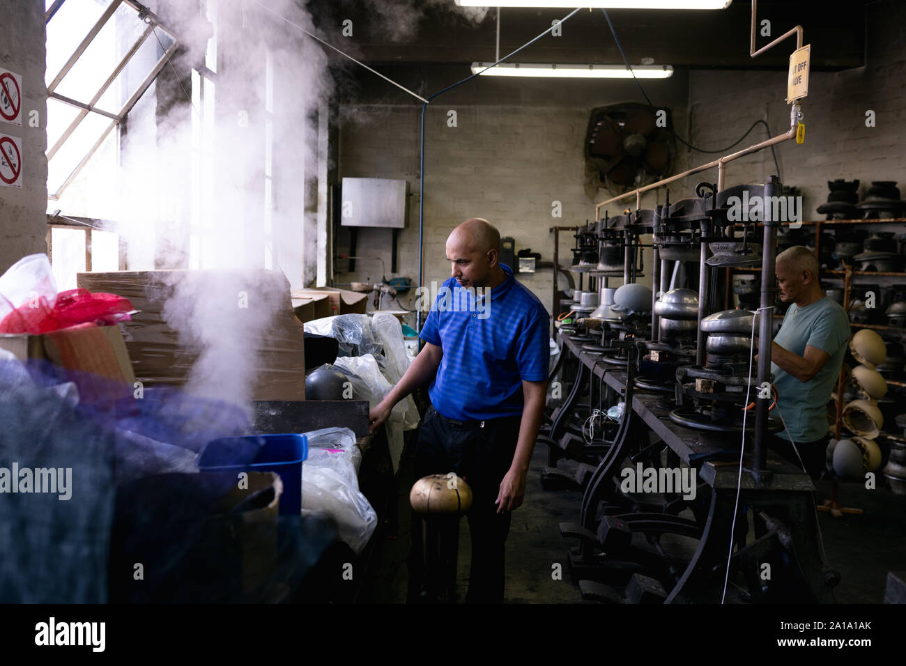 Men working in a hat factory Stock Photo - Alamy