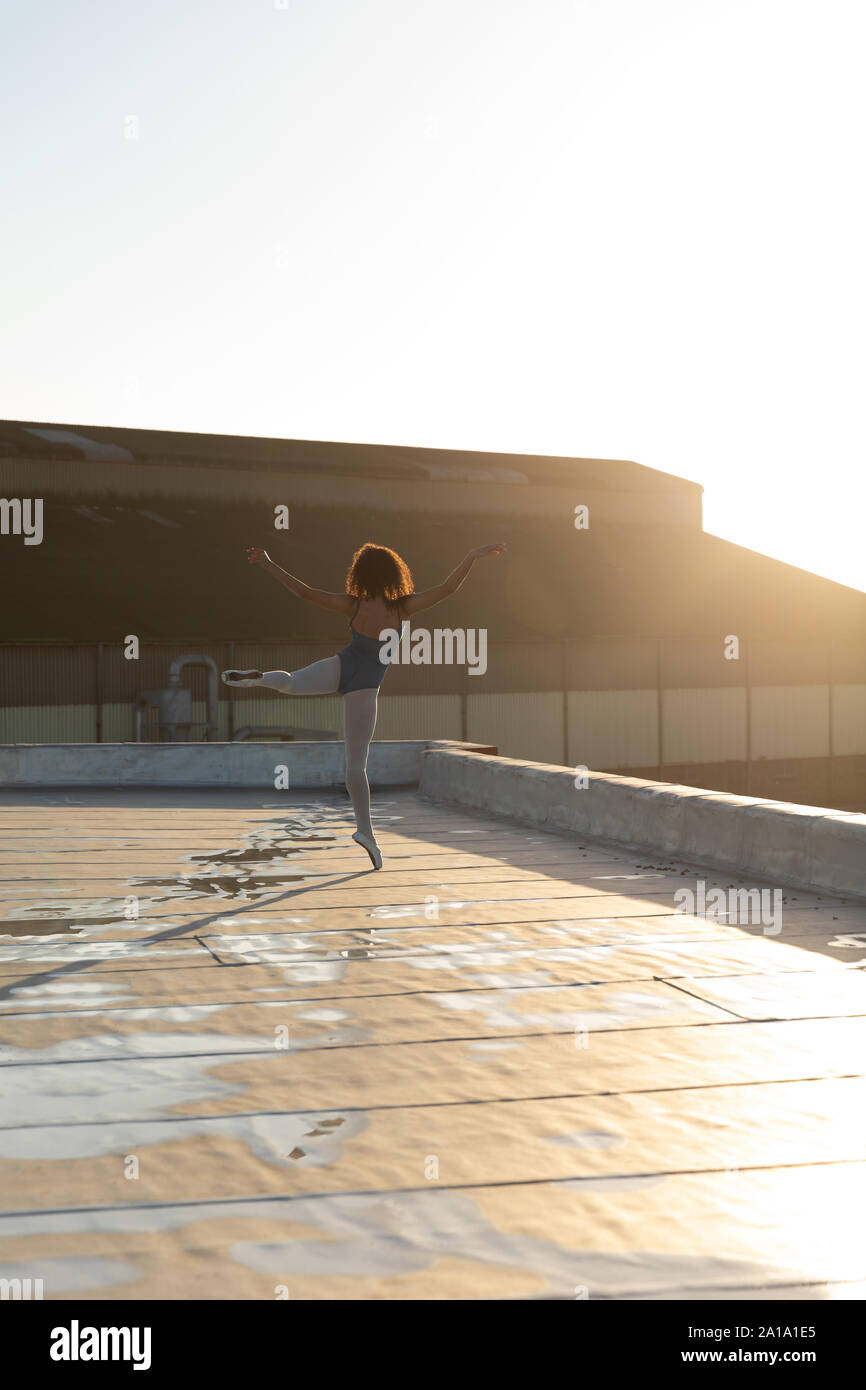 Female dancer on a rooftop Stock Photo - Alamy