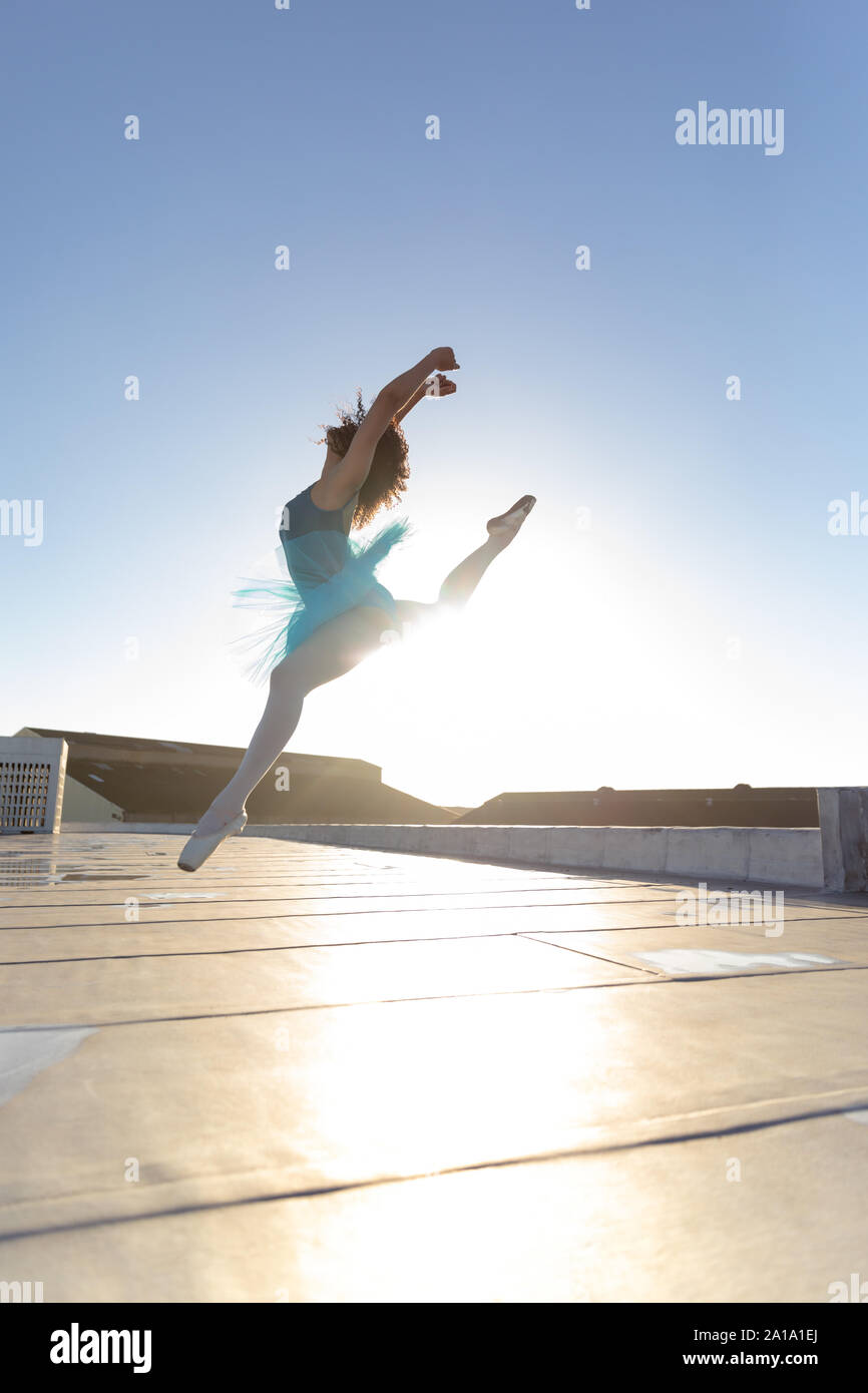Female dancer on a rooftop Stock Photo - Alamy