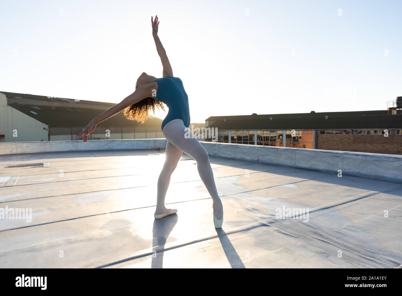 Female dancer on a rooftop Stock Photo - Alamy