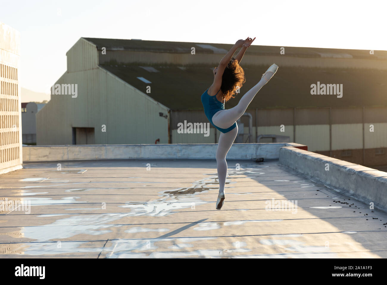 Female dancer on a rooftop Stock Photo - Alamy